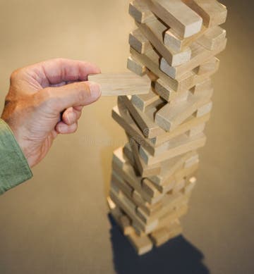 Hand with Precarious Building Blocks Stock Image - Image of dangerous ...