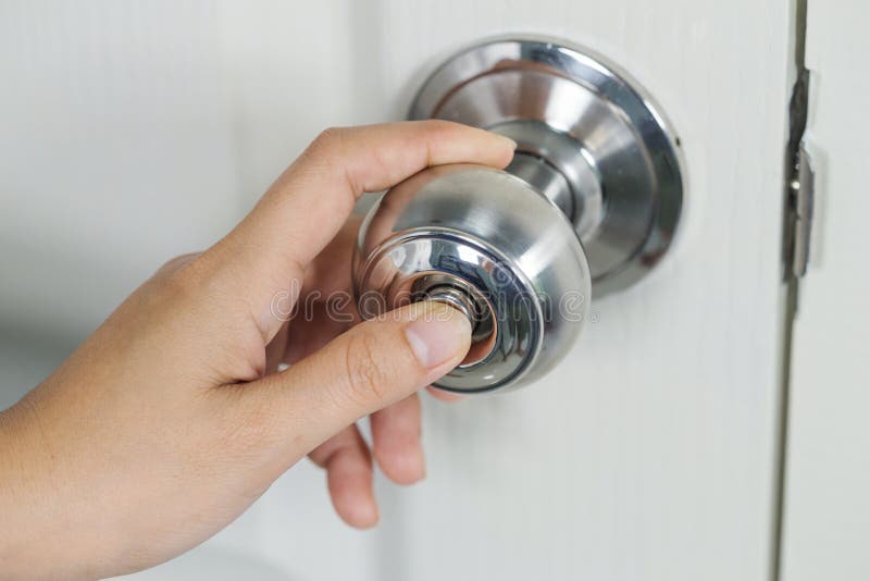 Hand Press Botton on Door Knob for Lock the Door Stock Photo - Image of ...
