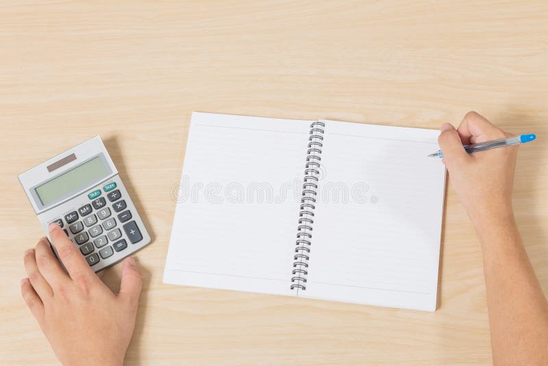 Hand Press Calculator and Writting on Notebook Stock Photo - Image of ...