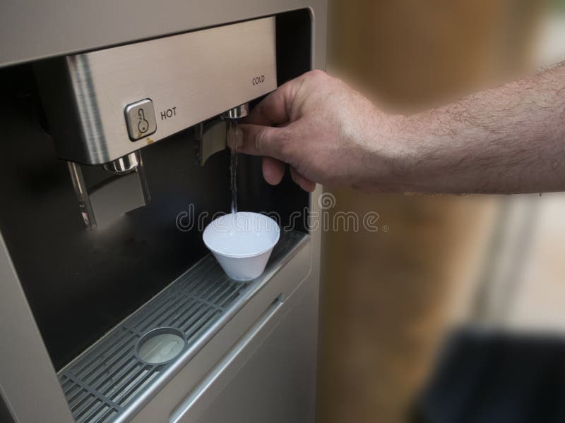 A Hand Pressing Water Machine Stock Image - Image of pressing, white ...