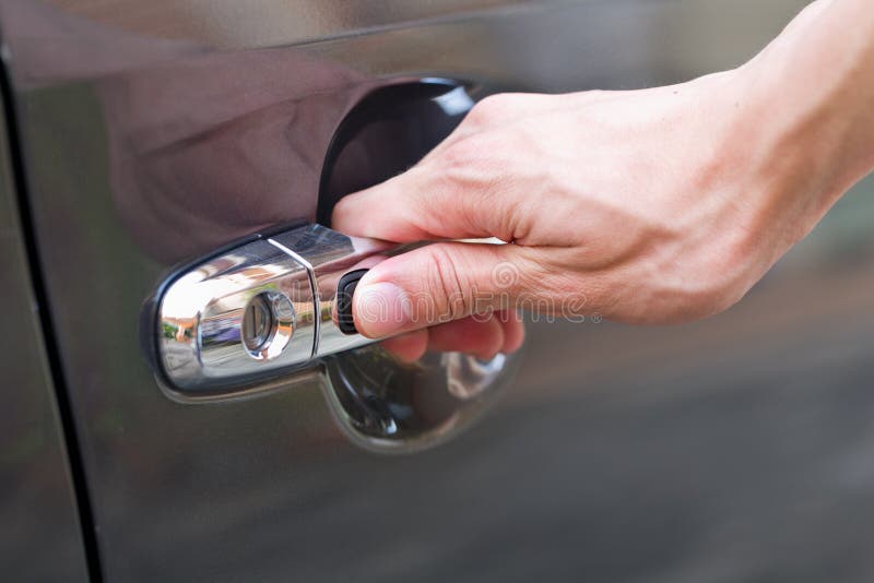 Hand Press Unlock Button Alarm System on Black Car . Stock Image ...