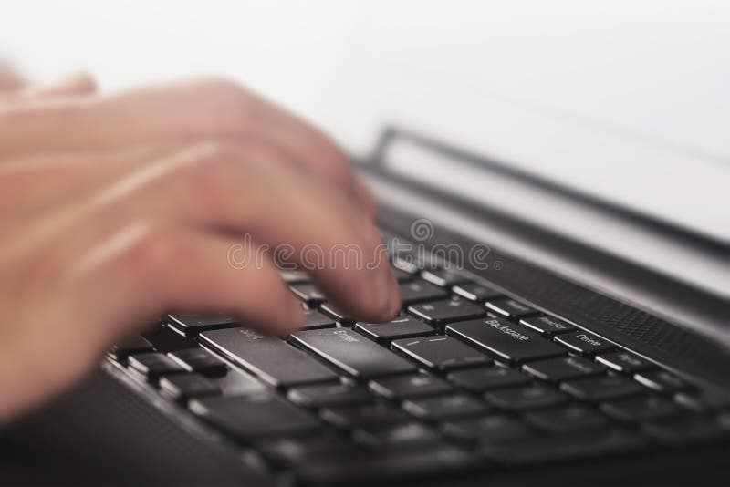 Hand Presses the Keys of a Computer Keyboard. Work at the Computer in ...
