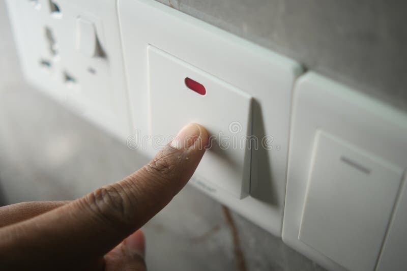 Person Pressing a Switch for Electrical Control in a Home Setting Stock ...