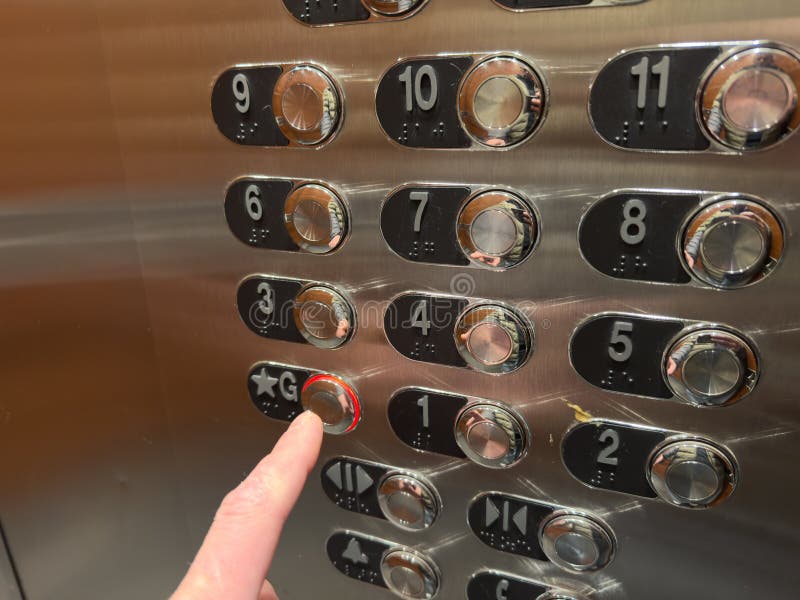 A Hand Presses the Silver Button Inside an Elevator Stock Image - Image ...