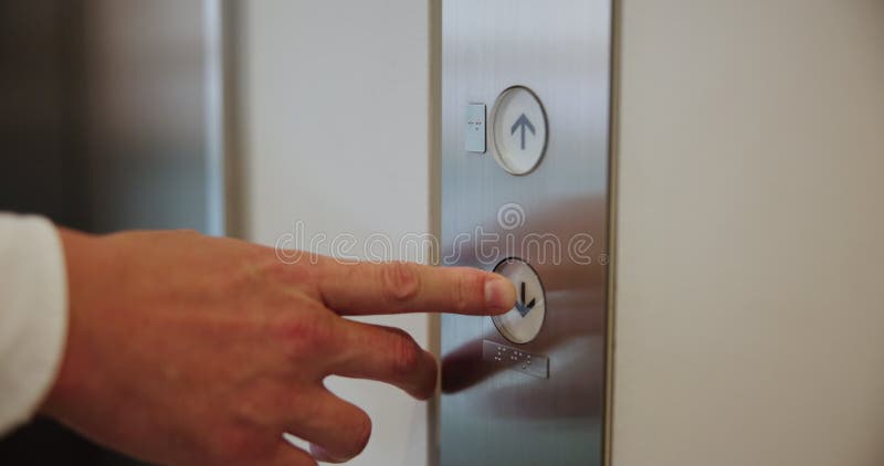 Hand Pressing Floor Button in Elevator, Close-up. Service Lift Stock ...