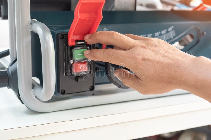 Hand Pressing on Electromagnetic Start Switch Table Saw Stock Image ...