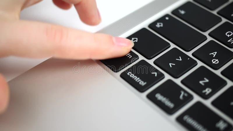 Hand Pressing the Globe Key on Modern Laptop Keyboard Close-up Slow ...