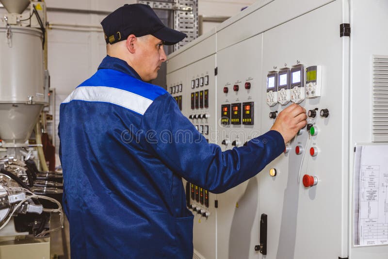 Hand Pressing on Green Button of the Machine in the Factory Stock Photo ...