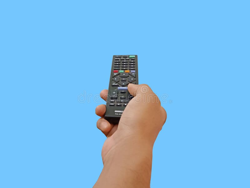 Hand Pressing Remote Control Isolated on Light Blue Background. Stock ...