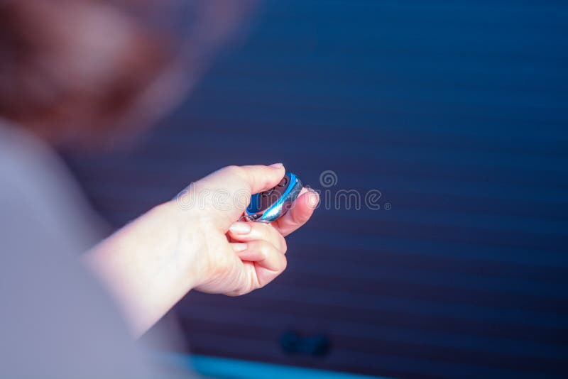 Hand Pressing Remote Control To Open Automatic Garage Door Stock Image ...