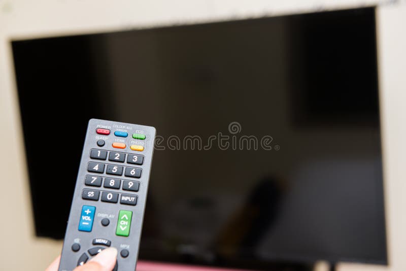 Hand Pressing Remote Control To Turn on the TV Stock Image - Image of ...