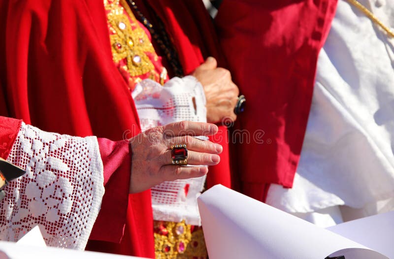 Priest with a Ring with a Red Ruby while Giving the Blessing To the ...