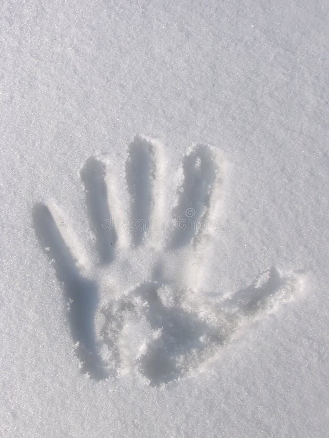 Handprint isolated in snow stock photo. Image of conceptual - 9101150