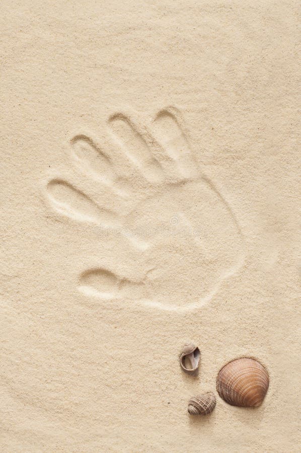 Hand print in sand stock photo. Image of italy, kids - 68973558