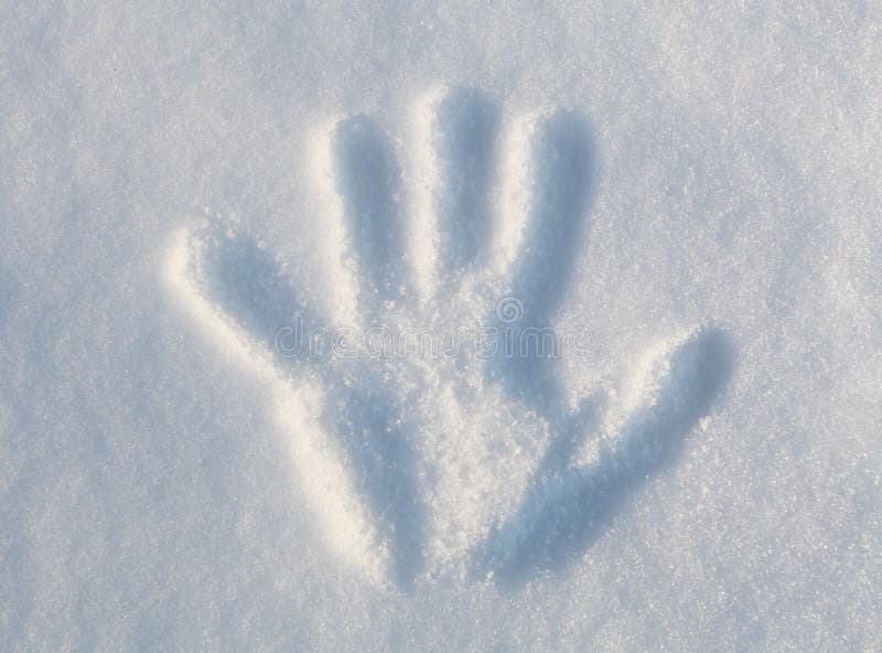 Hand Print in Snow stock image. Image of body, pattern - 28992639