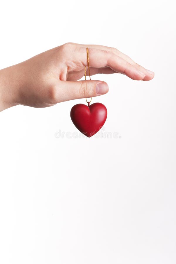 Hand protecting a heart stock photo. Image of isolated - 22988200