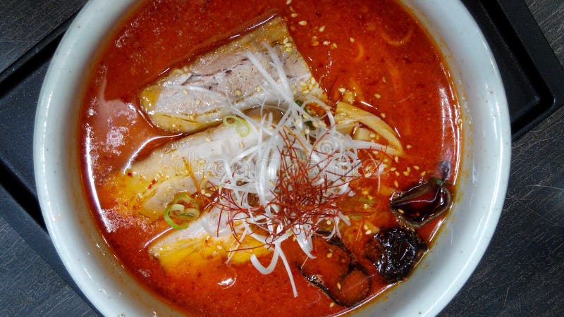Hand Pulled Stretched Chinese Ramen Noodles on a Bowl with Chopstick ...