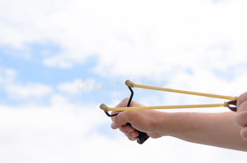 Hand Pulling Bands of His Stone Shooter Stick Stock Photo - Image of ...