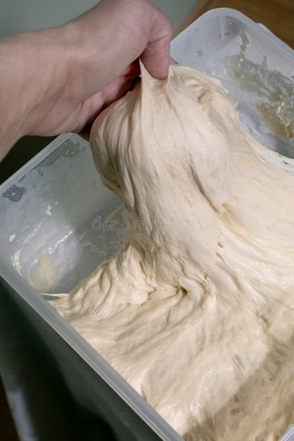 Hand Stretching Dough Container Stock Photos - Free & Royalty-Free ...
