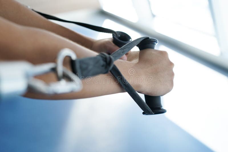 The Hand is Pulling the Fitness Machine in the Gym. Stock Image - Image ...