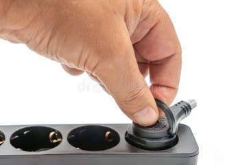 Hand Pulling Out Socket Plug Isolated on White. Stock Image - Image of ...