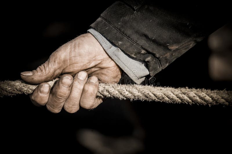 Hand Pulling the Rope, Grey Background Stock Image - Image of pull ...