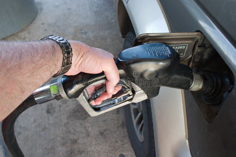 Hand Pumping Gas Fuel stock photo. Image of filling, petroleum - 2437032