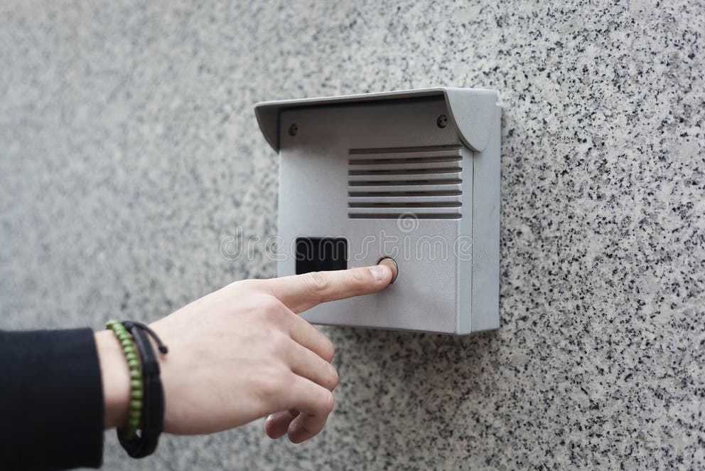 Hand Pushing Buzzer Button on a Wall Stock Photo - Image of date ...
