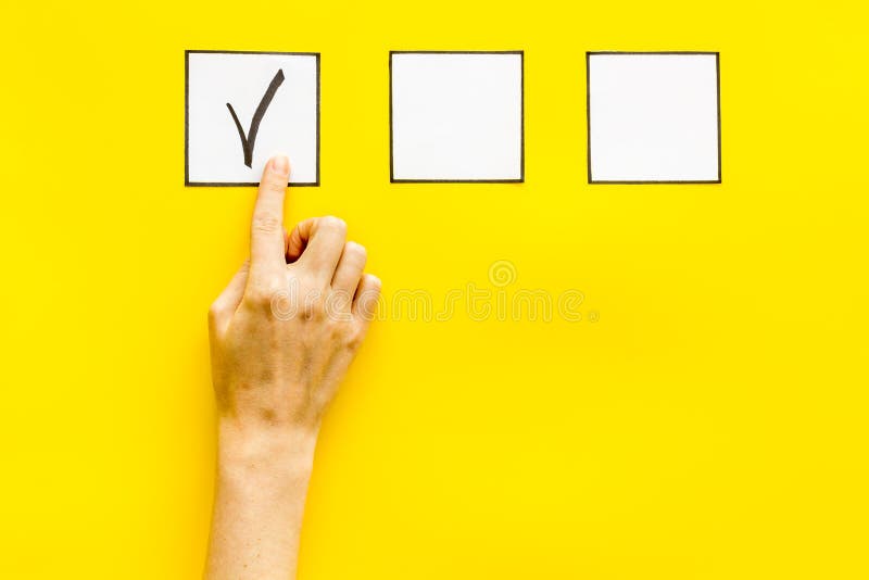 Hand Put Check Mark in Check-box on Yellow Background Top View Copy ...