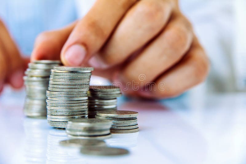 Hand put coin to stack stock photo. Image of hand, cash - 265815002