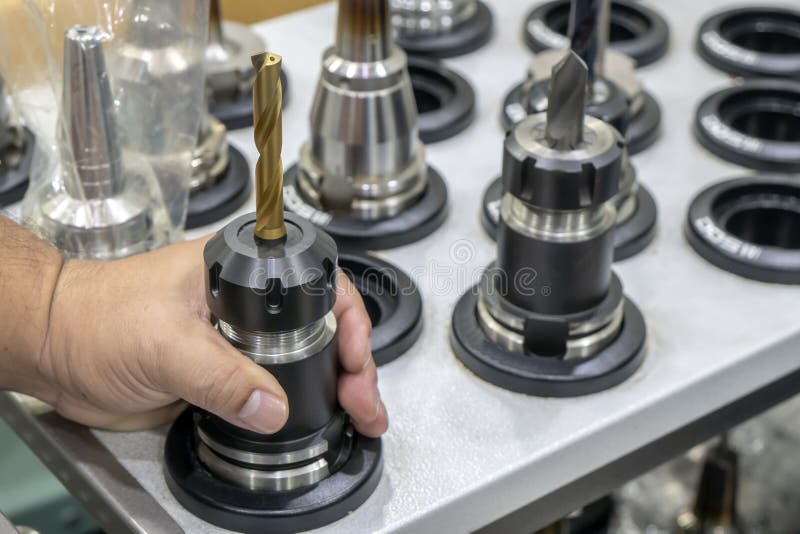 The Hand Put the Cutting Tool in Holder. Stock Photo - Image of ...