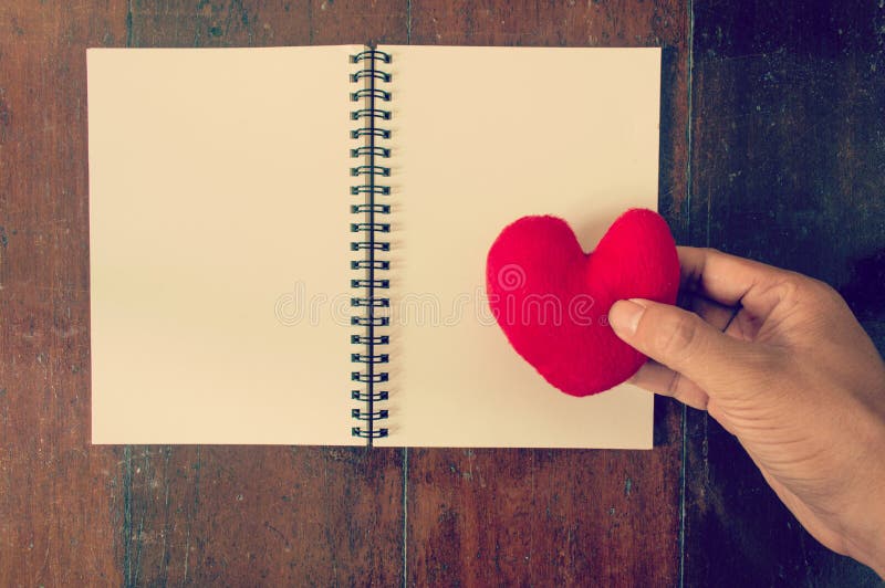 A Red Heart with a Note about the World Kindness Day Lies on the Wooden ...