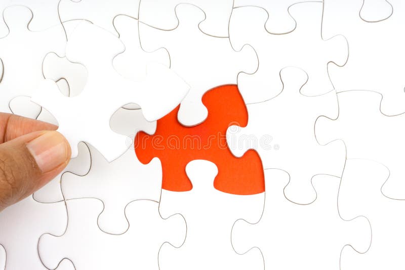 Hand Put the Last Piece of Jigsaw Puzzle Closeup To Complete the ... Hand Put the Last Piece of Jigsaw Puzzle Closeup To Complete the ...