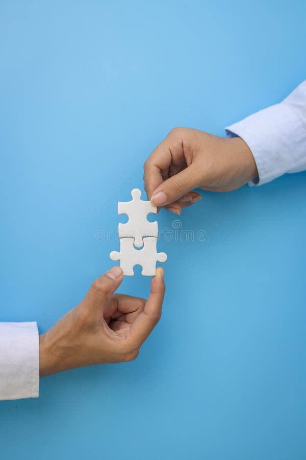 Hand Put the Last Piece of Jigsaw Puzzle To Complete the Mission ...