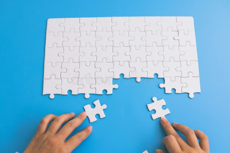 Hand Put the Last Piece of Jigsaw Puzzle To Complete the Mission ...