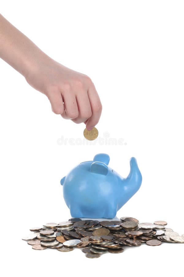 Hand Puts a Coin in a Piggy Bank Stock Photo - Image of caucasian, hand ...