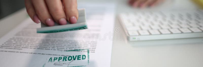 The Hand Puts the Stamp Approved on the Document Stock Image - Image of ...
