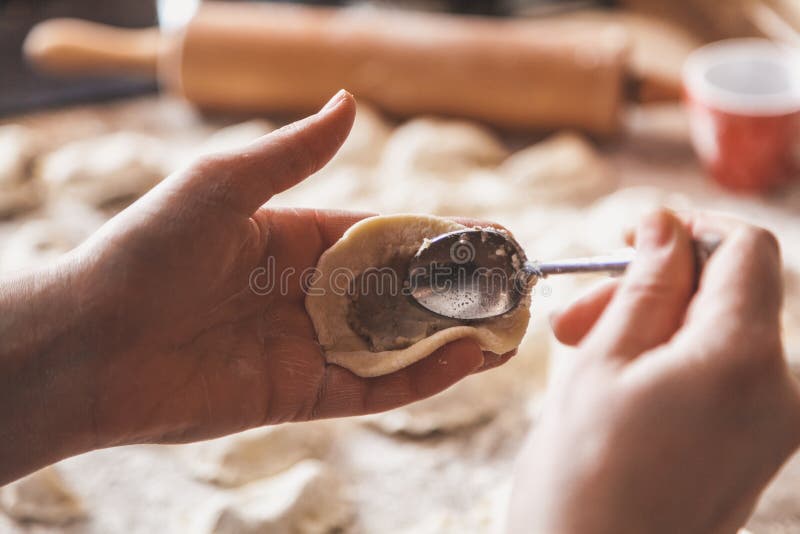 Hand Puts Stuffing in Dumpling Spoon Stock Image - Image of kitchen ...