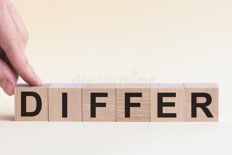 DIFFERENT Message Word on a Wooden Desk on Cube Stock Image - Image of ...