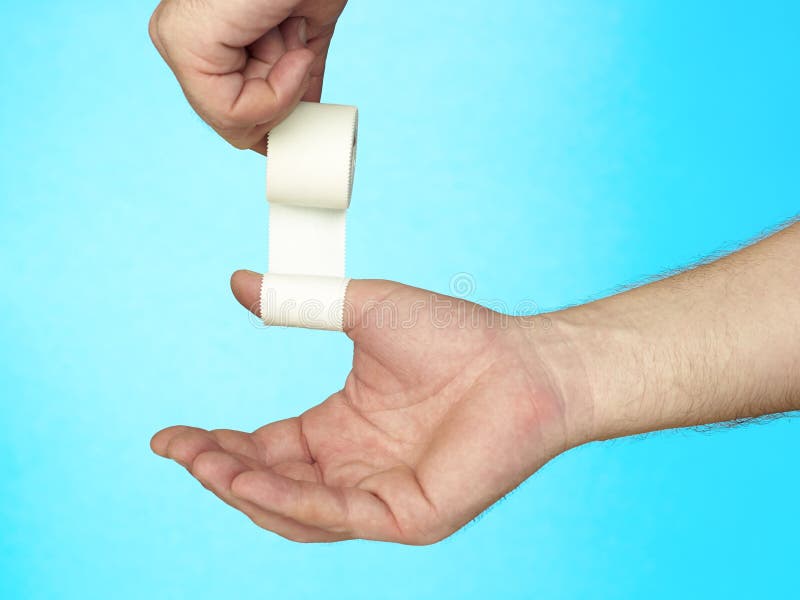 Hand Putting Adhesive Bandage on Knee. Stock Photo - Image of wound ...