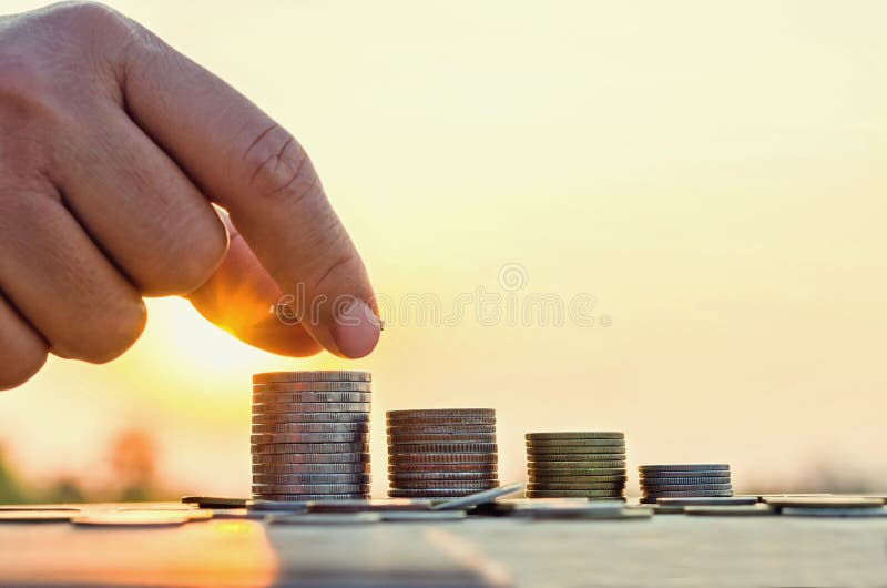 Hand Putting Coin on Coins Stack with Concept Stock Photo - Image of ...