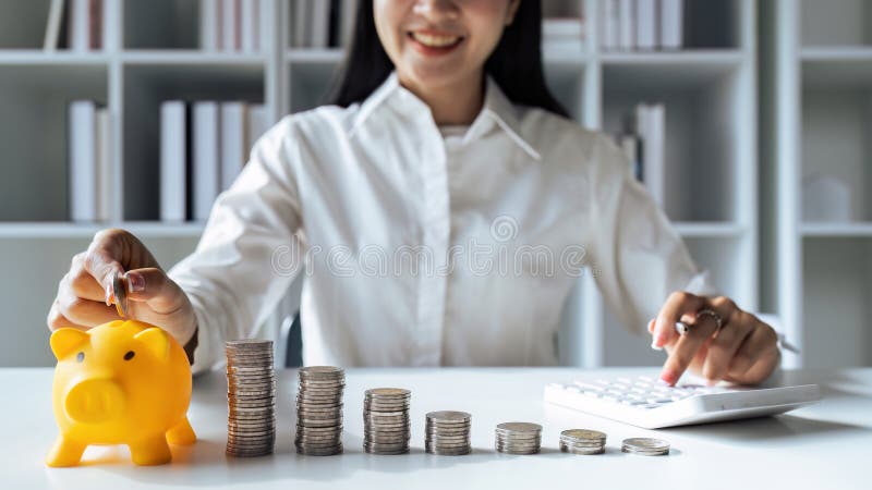 Hand Putting Coin Stack Step Staircase on Desk Wit Calculator. Save ...
