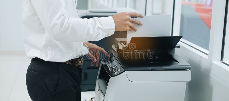 Hand Putting a Document Paper into Printer Scanner or Laser Copy ...