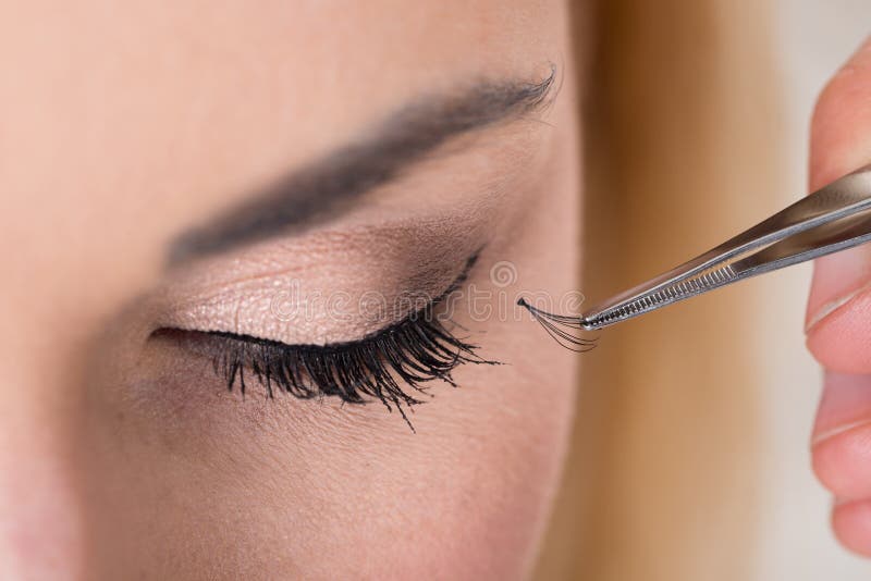 Hand Putting False Eyelashes on Woman Stock Image - Image of cropped ...