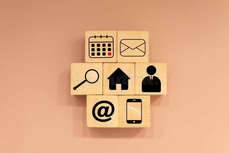 Hand Putting the Last Piece of Wooden Blocks with the Gear Icon. Team ...