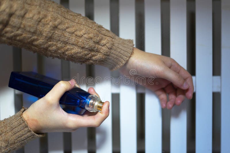 Hand Putting Perfume on Her Wrist Stock Photo - Image of spraying ...
