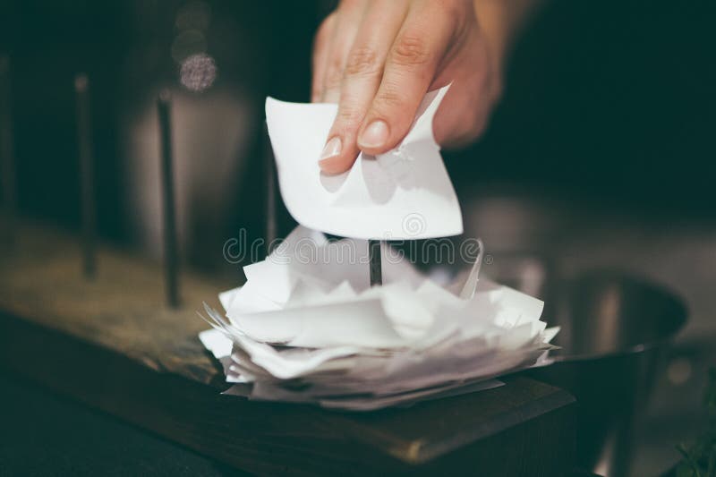 Hand Putting Restaurant Order Ticket on Stick Stock Image - Image of ...