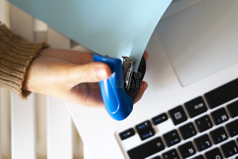 Hand Putting Staples on Sheets in an Office Stock Image - Image of ...