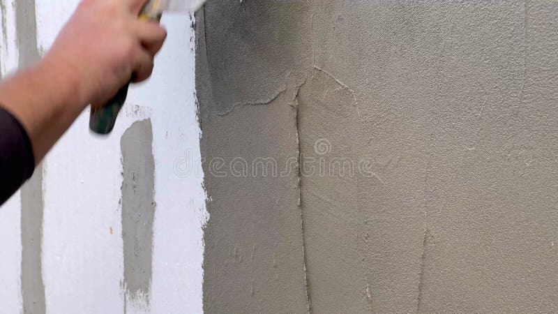 Hand with a Putty Knife, Apply the Putty To the Wall. Process of ...