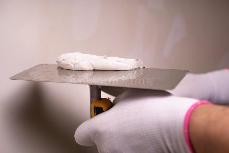 Hand with Putty Knife Repair Wall, Hand with a Spatula, Spatula with ...